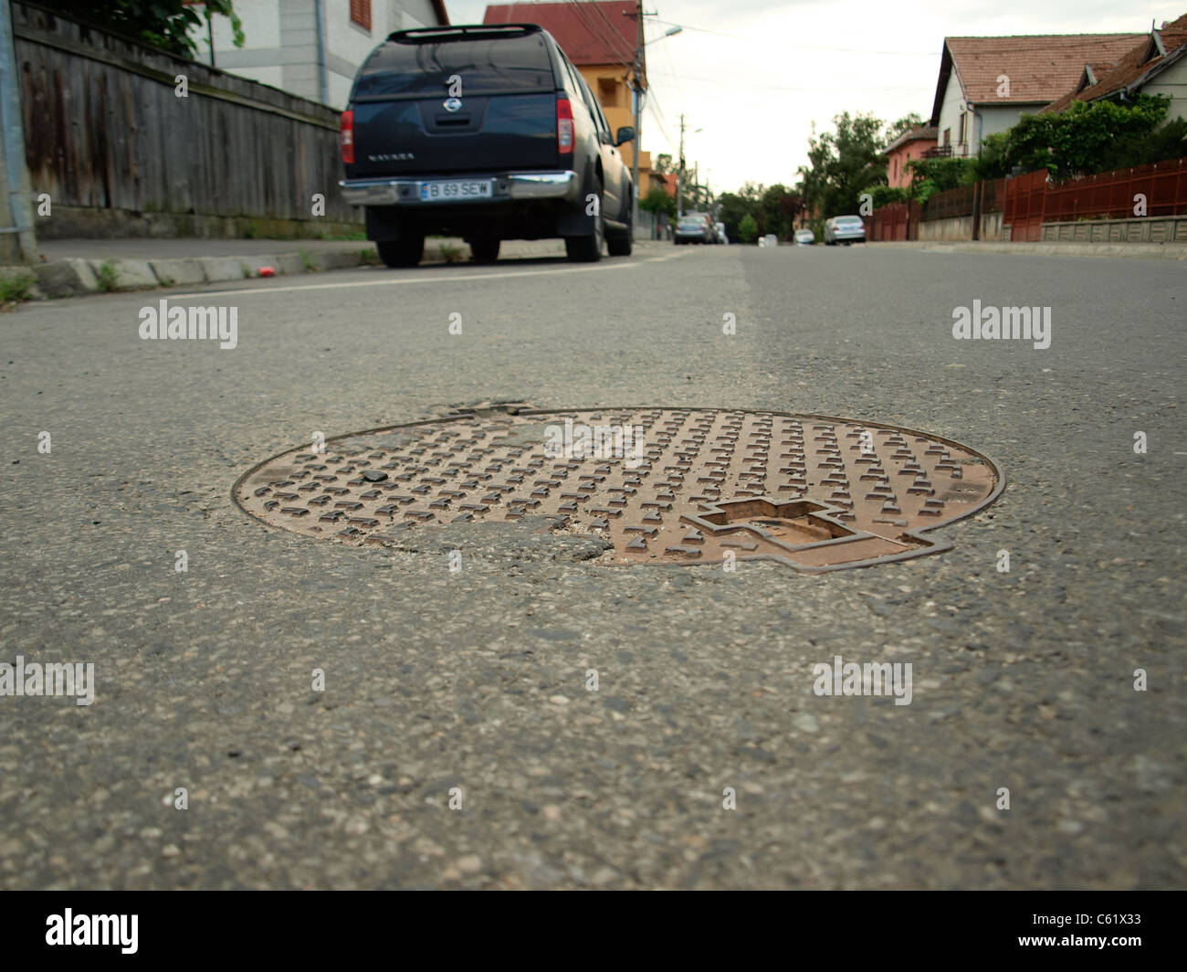 Street, sewers entry Stock Photo - Alamy