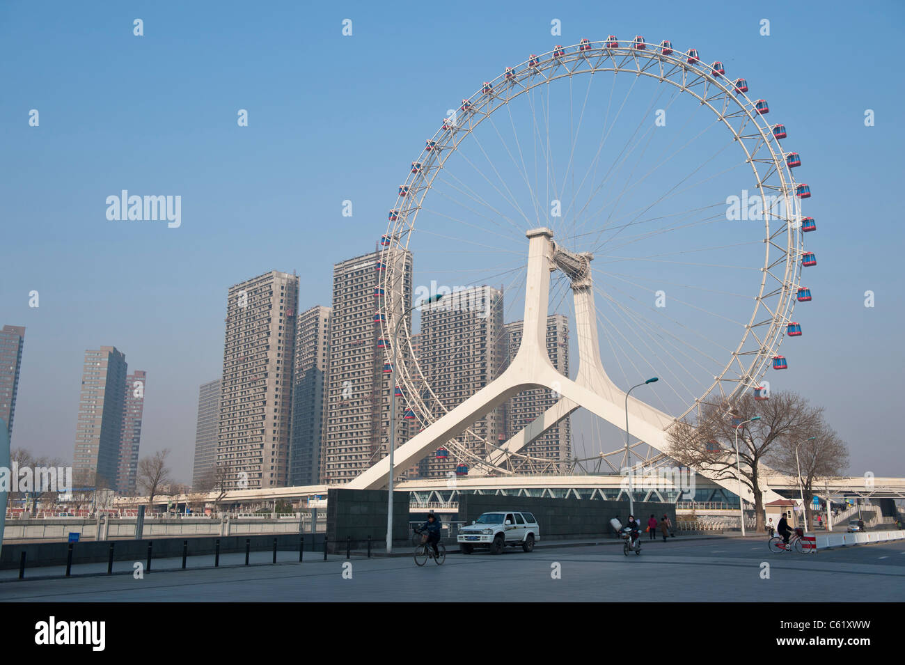 The Tianjin Eye Ferris Wheel on Yongle Bridge over the Hai River, China ...
