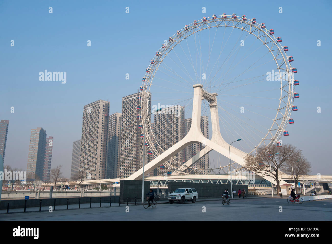 The Tianjin Eye Ferris Wheel on Yongle Bridge over the Hai River, China ...