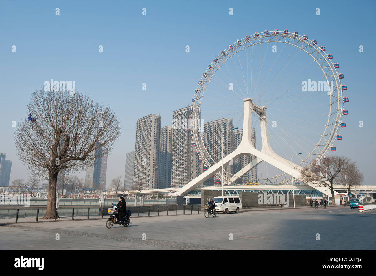 The Tianjin Eye Ferris Wheel on Yongle Bridge over the Hai River, China ...