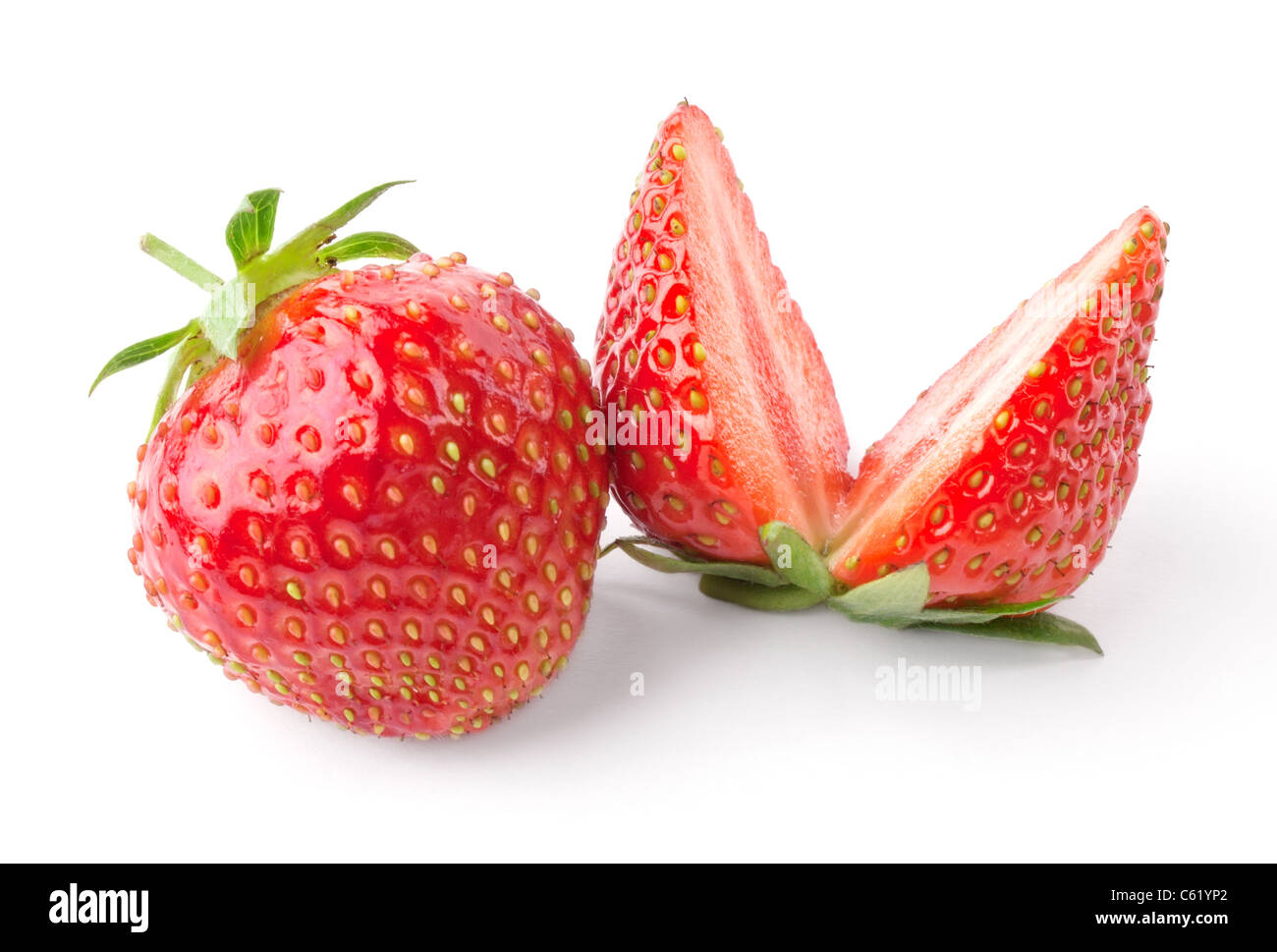 strawberry cut in half isolated on white background Stock Photo - Alamy