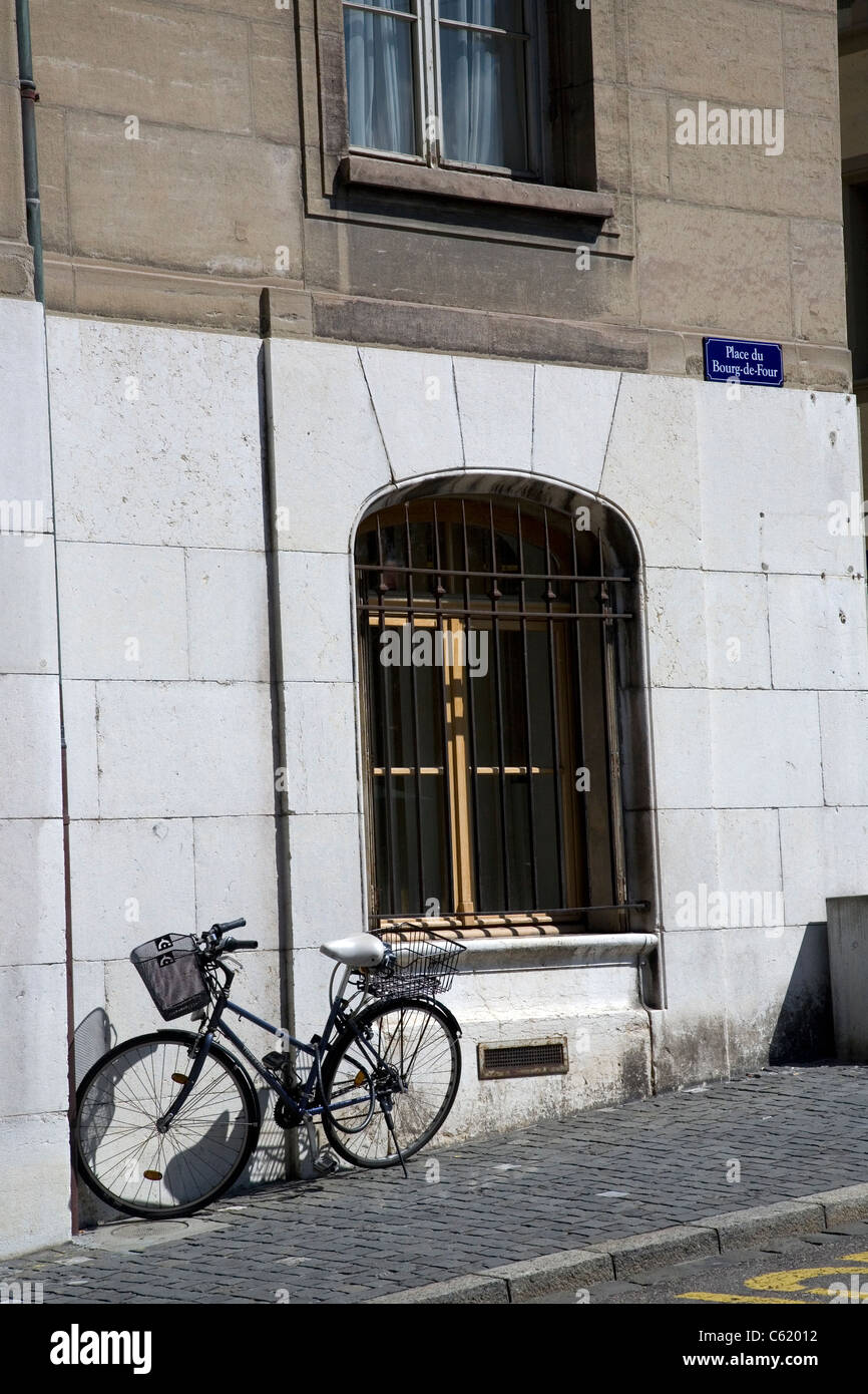 Bicycle Against Wall in Geneva Old Town Stock Photo - Alamy