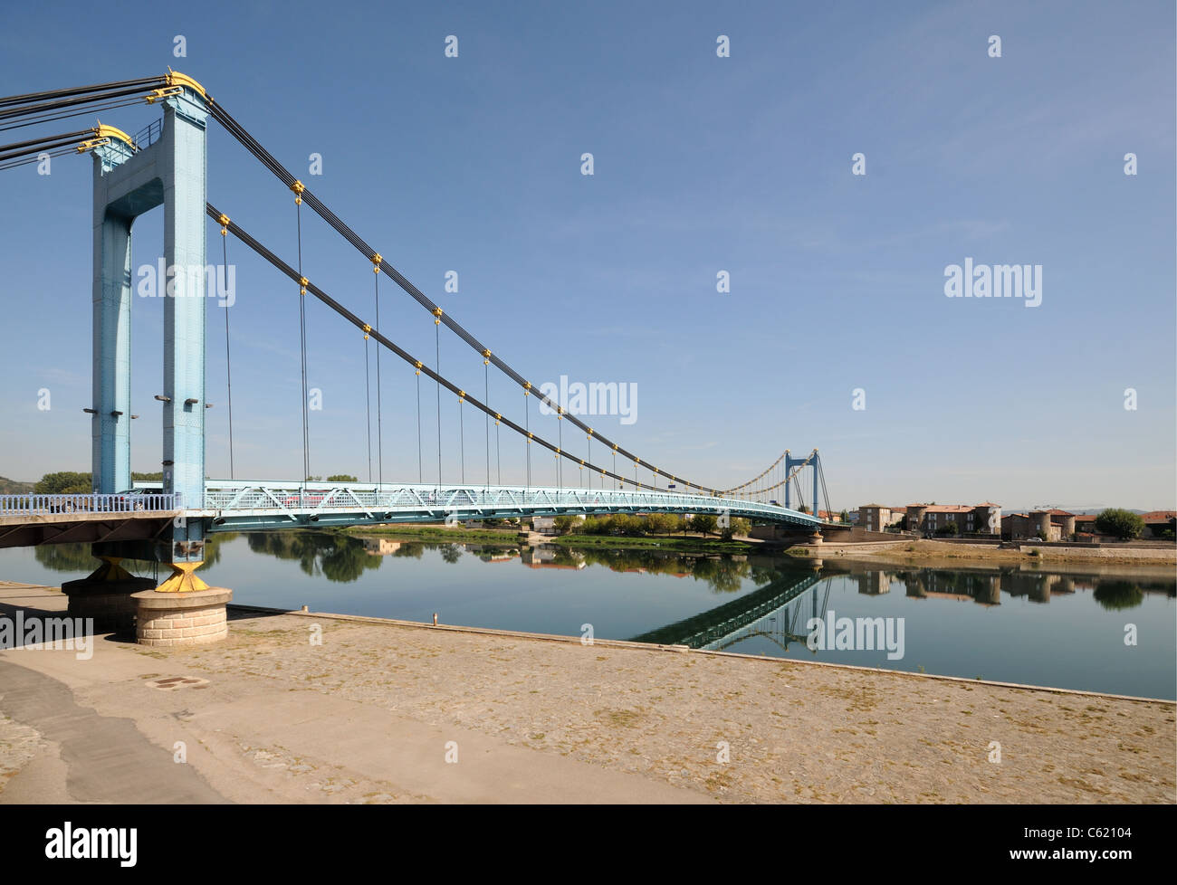 Suspension road bridge over river Rhone between Serrieres and Sablons ...