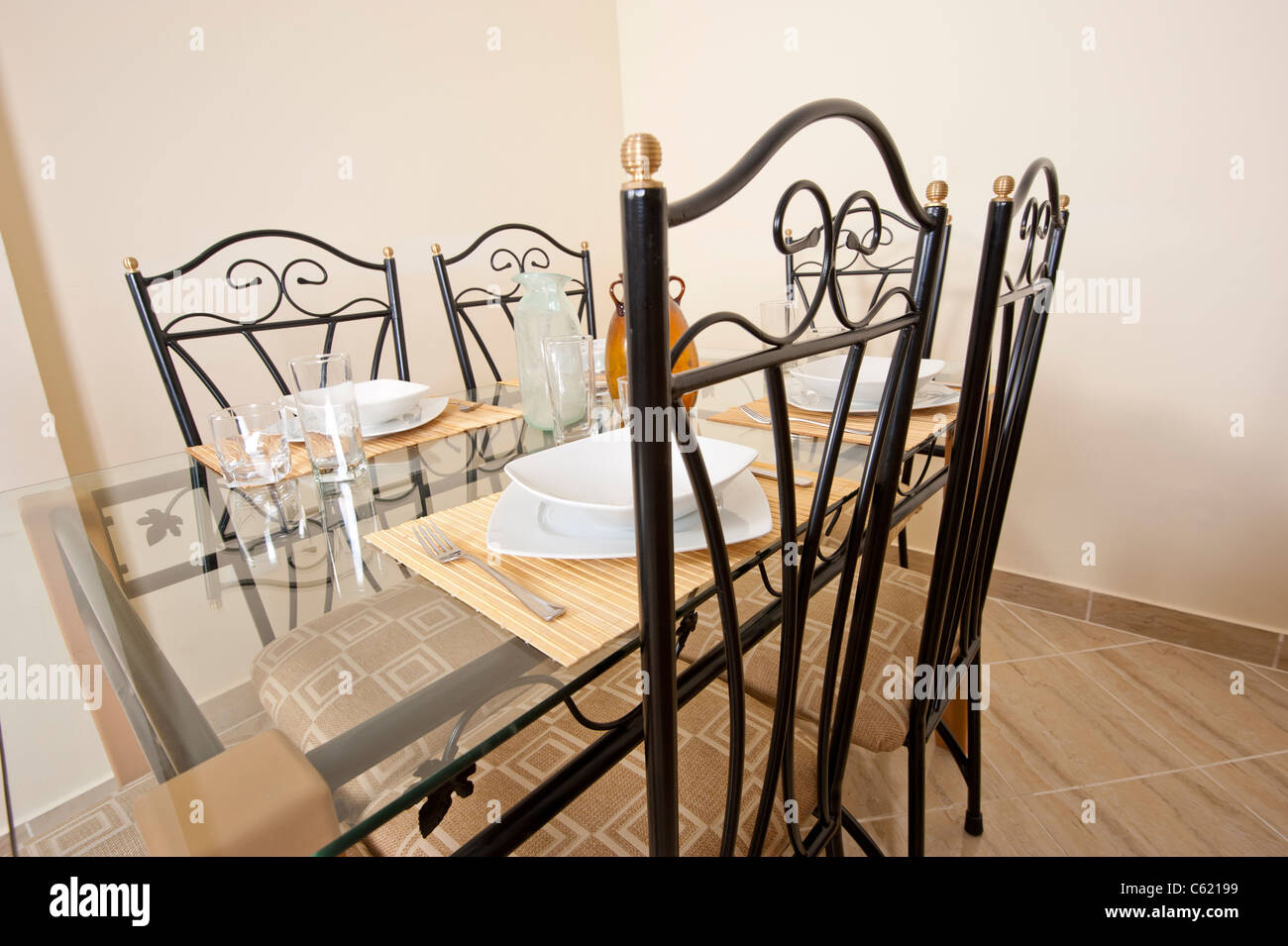 Dining table and chairs in a house Stock Photo - Alamy