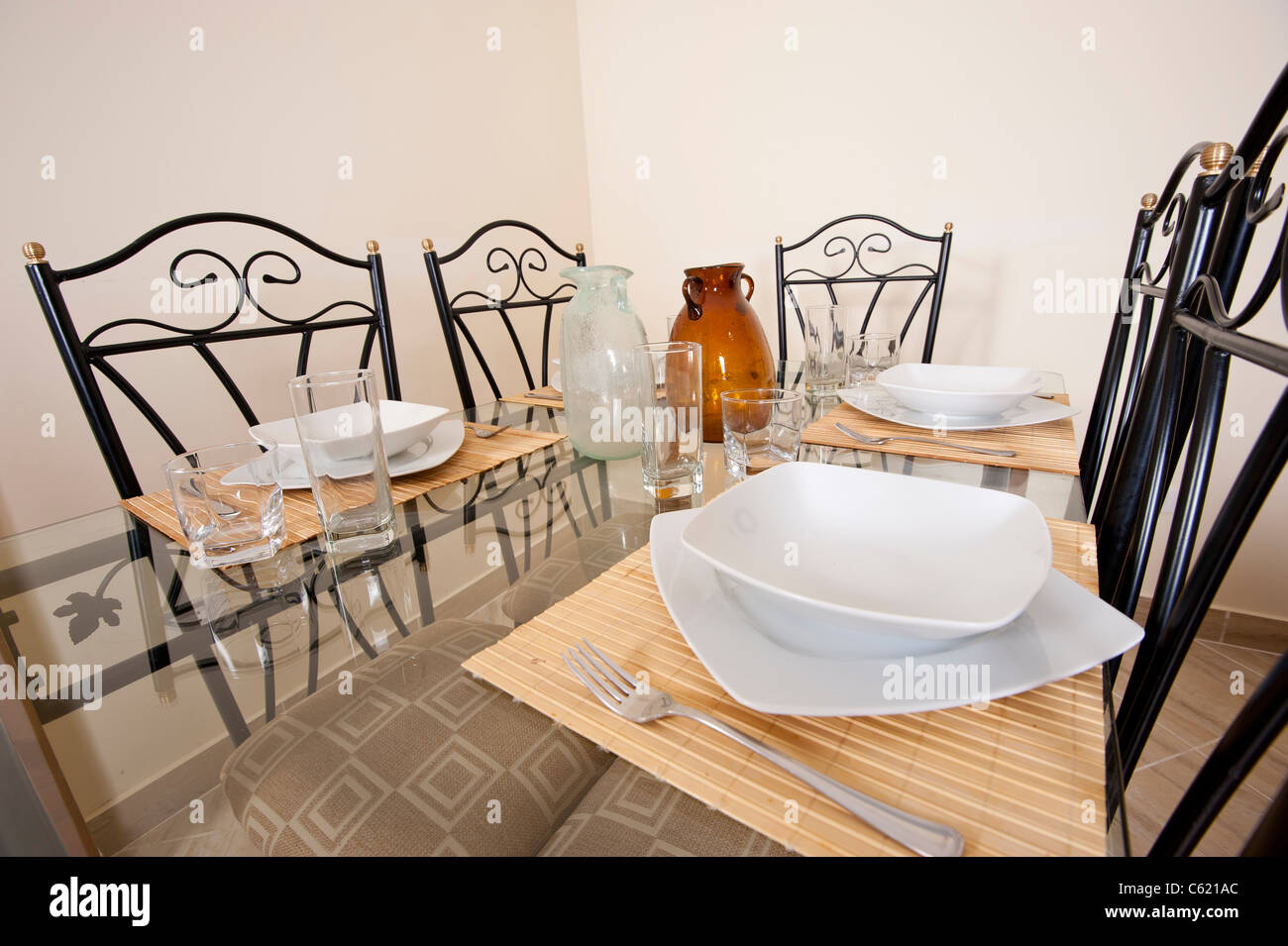 Dining table and chairs in a house Stock Photo - Alamy