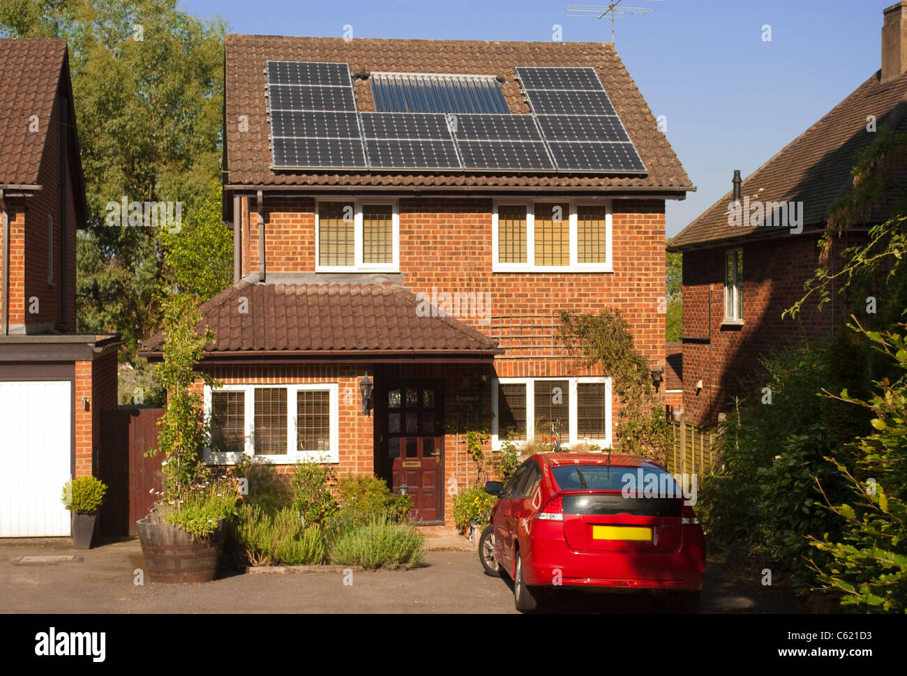 Solar panels on house roof with regenerative energy system Stock Photo ...