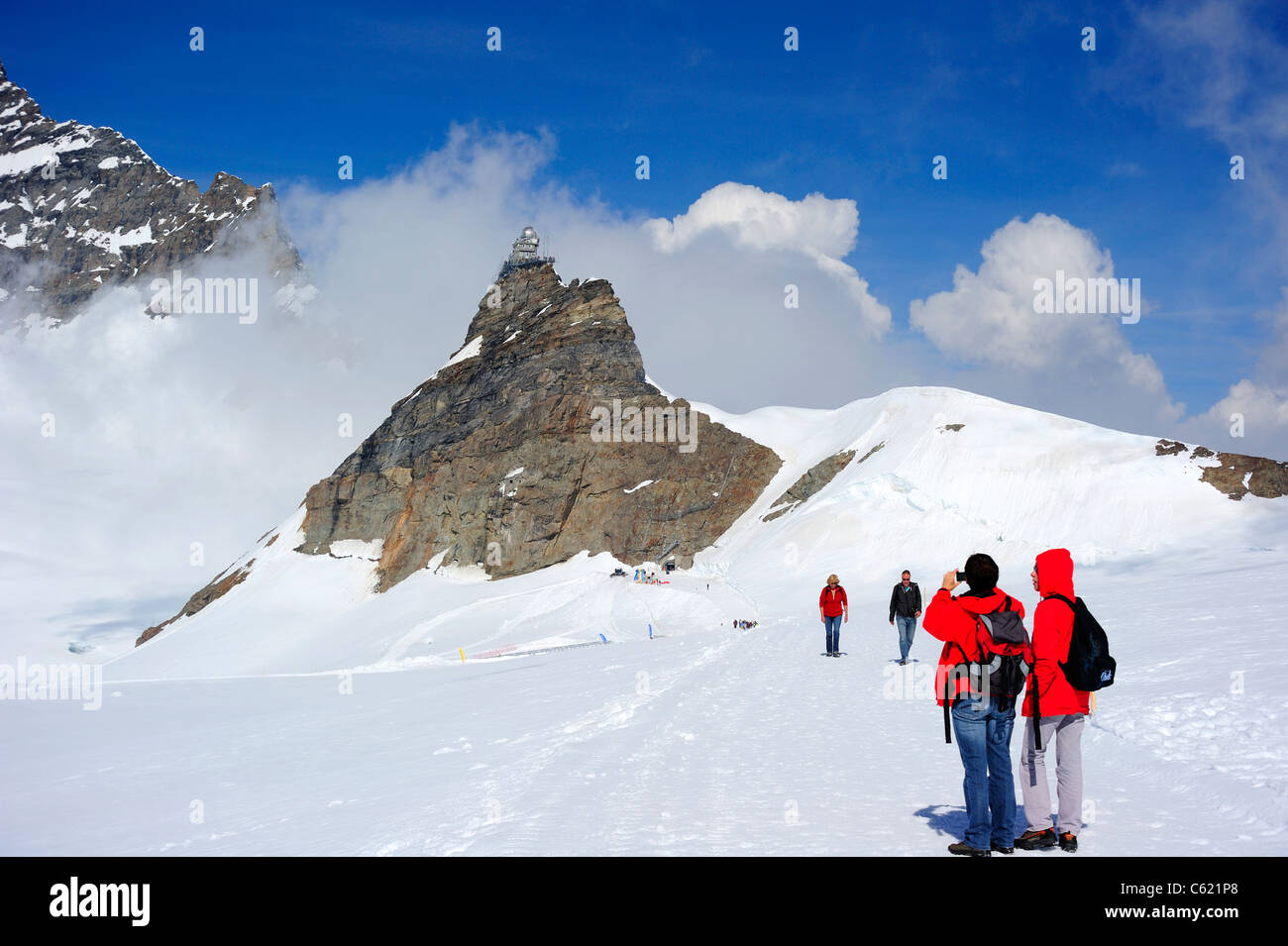 The Jungfraujoch in cloud, looking back at it from the path leading to ...