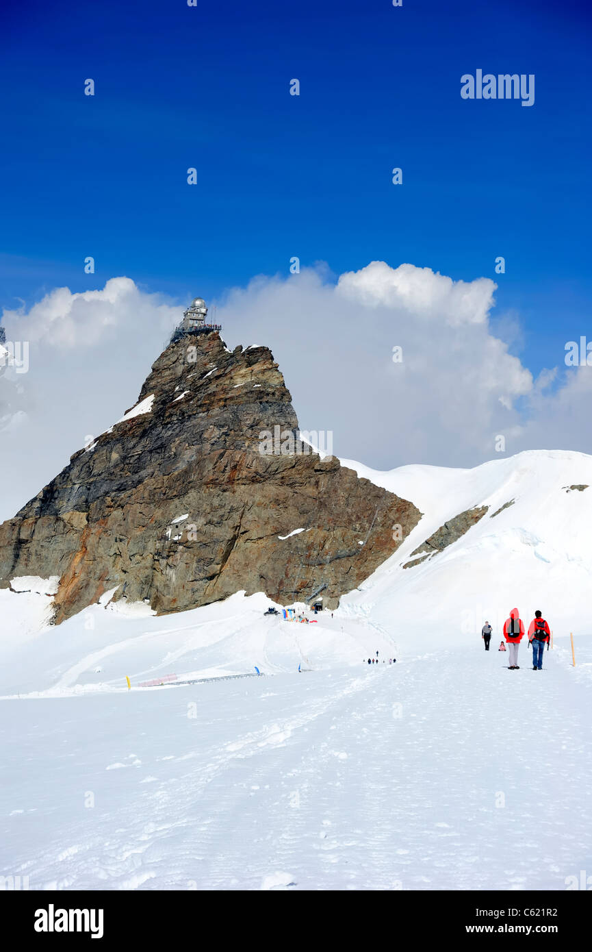 The Jungfraujoch in cloud, looking back at it from the path leading to ...