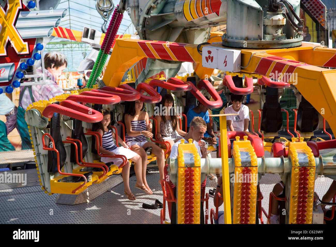 Youth on Fairground Ride Stock Photo - Alamy