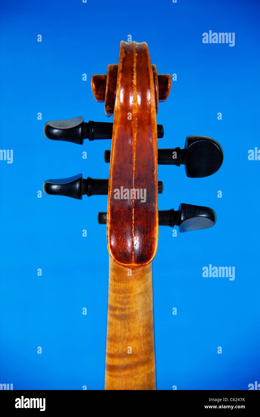 The fingerboard violin, isolated on a blue background Stock Photo - Alamy