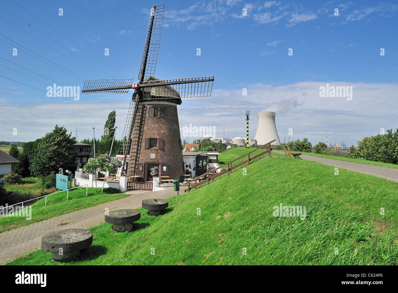 The windmill Scheldedijkmolen and cooling towers of the Doel Nuclear ...