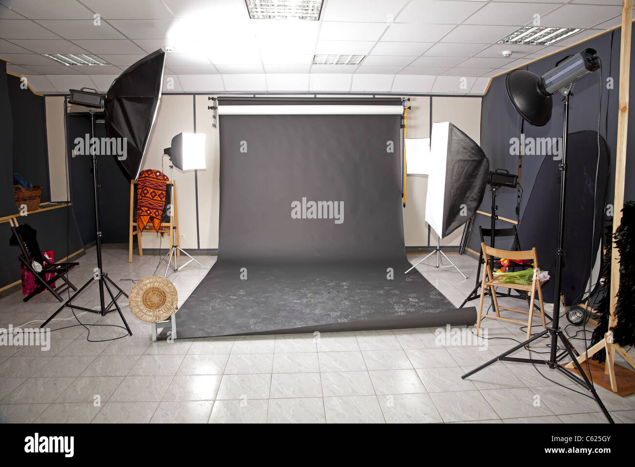Professional studio interior with black background and number of ...