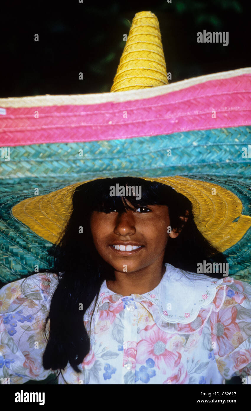 Portrait of smiling Indian girl with big colorfull hat in Mexico Stock ...