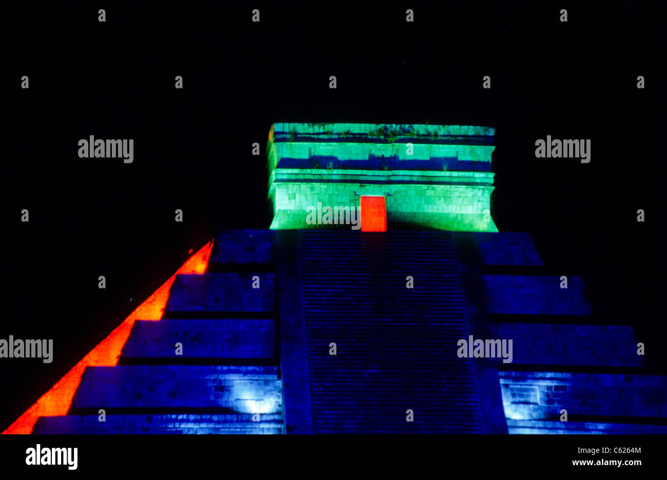Chichen Itza Maya pyramid in colorfull light at night show inYucatan ...
