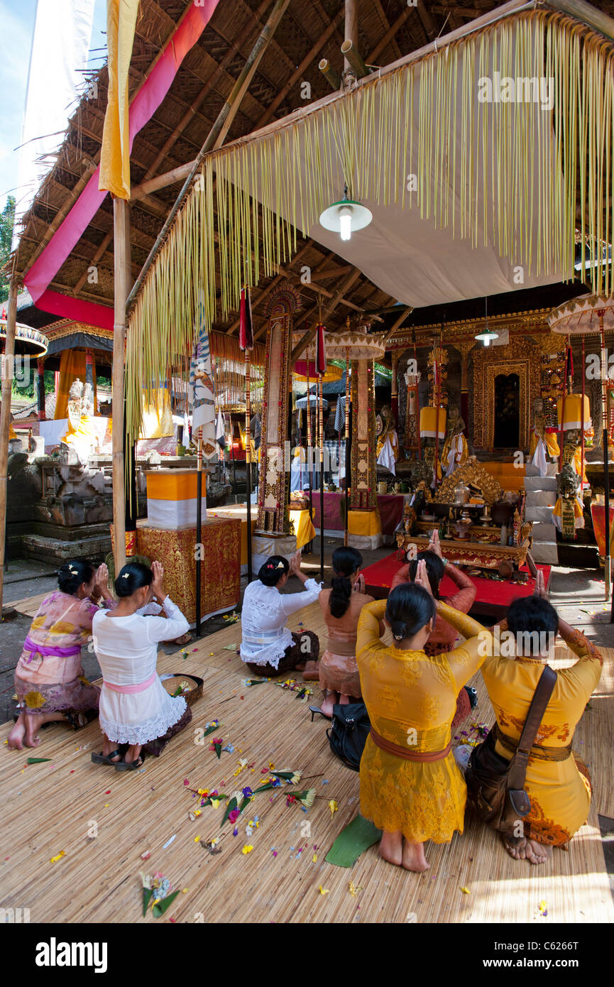 Women Praying at the Altar in Kehen Temple in Bali, Indonesia Stock ...