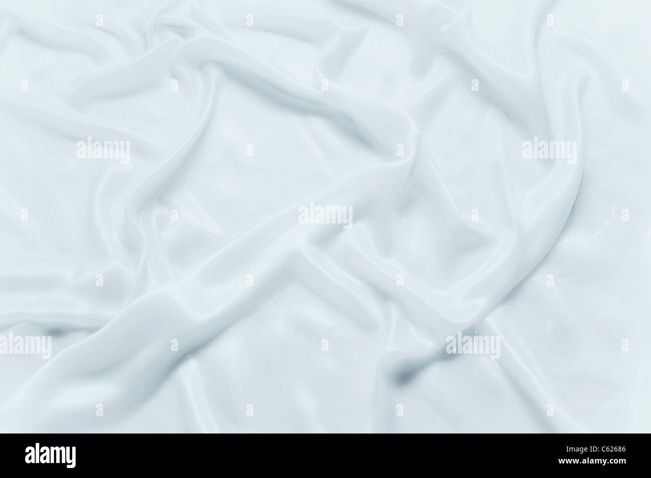 delicate waves of satin silk close up Stock Photo - Alamy