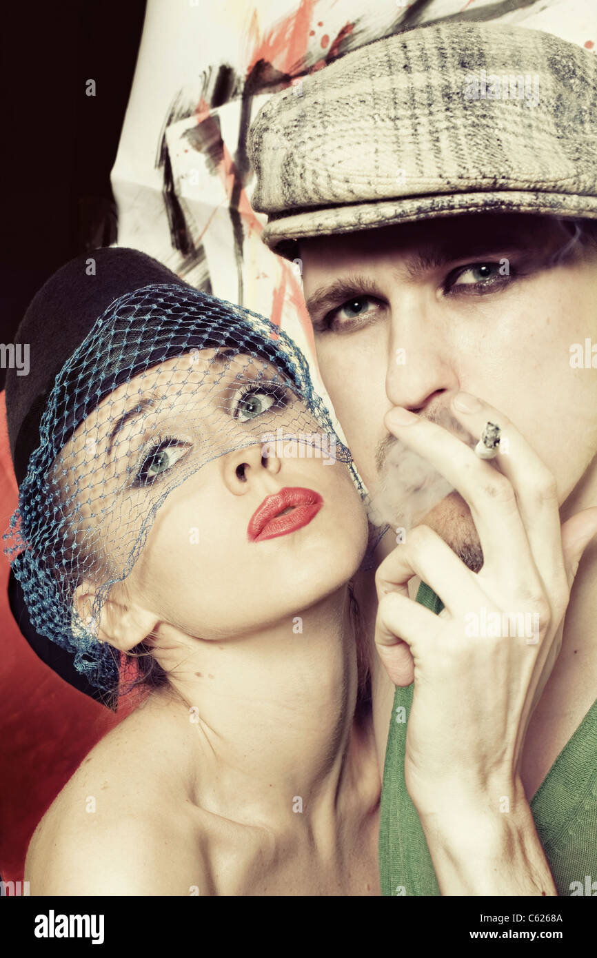 Studio portrait of young men and women in retro style Stock Photo - Alamy