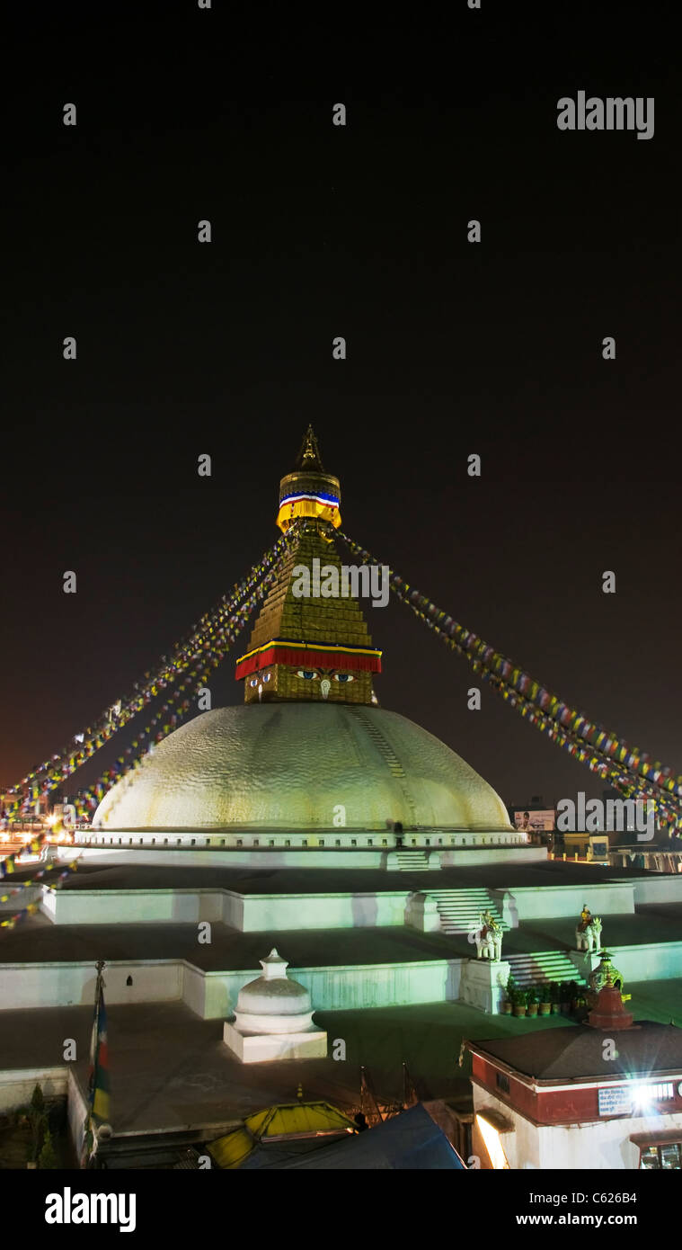 The Boudhanath Stupa photographed at night from one of the terraces ...