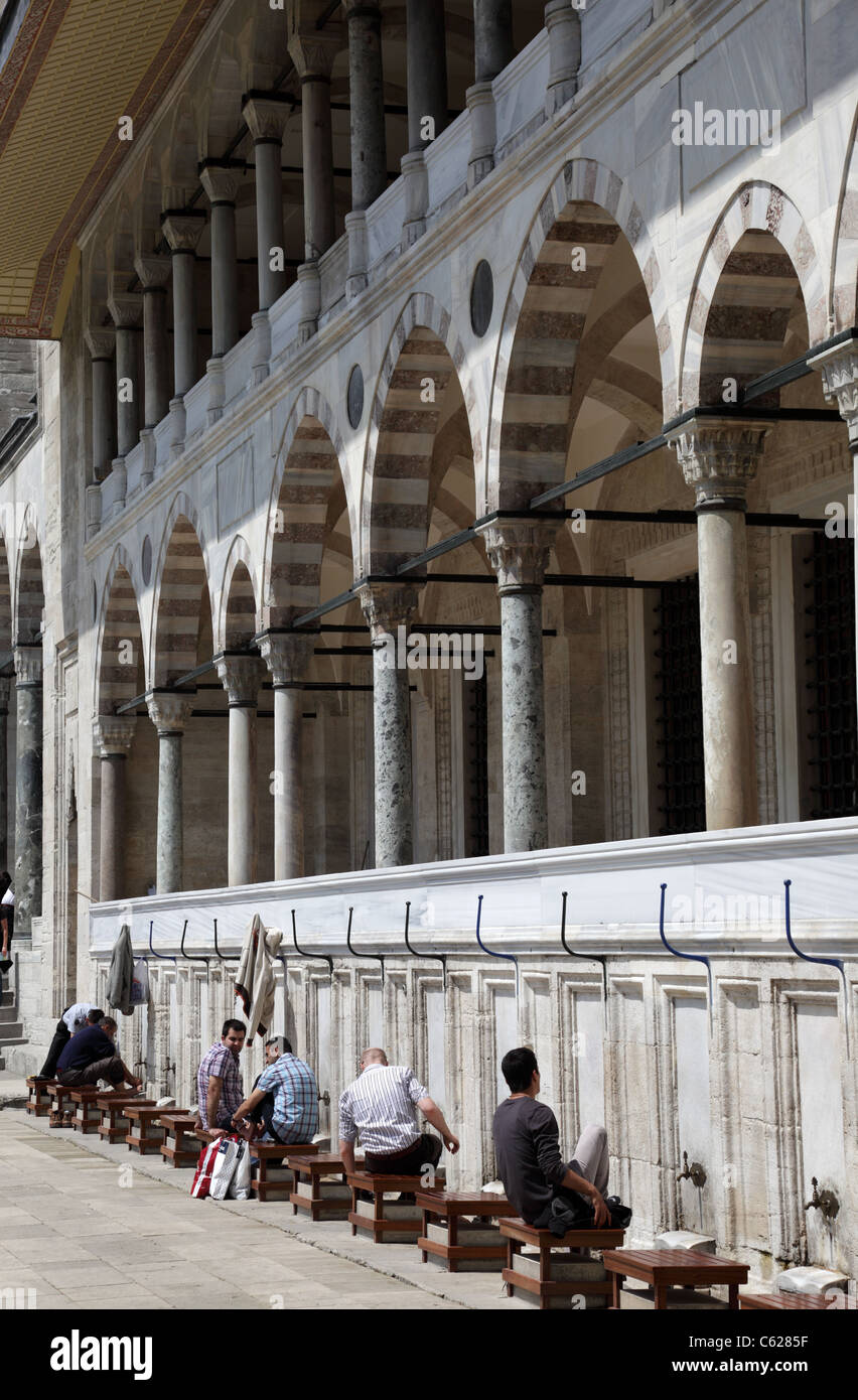Muslim men washing in front of the mosque. Istanbul, Turkey Stock Photo ...