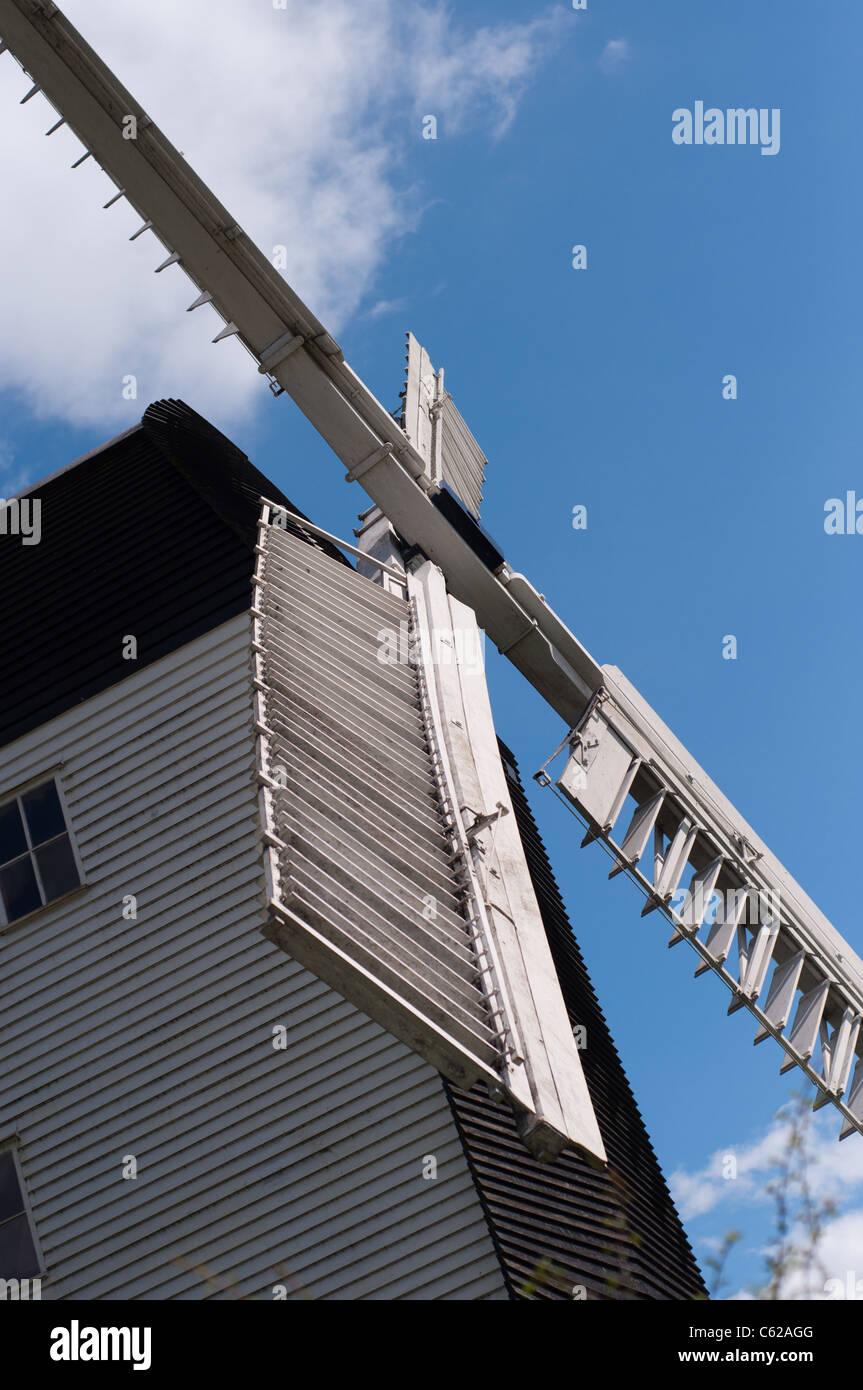 Mountnessing Post Mill set in the english countryside with a blue sky ...