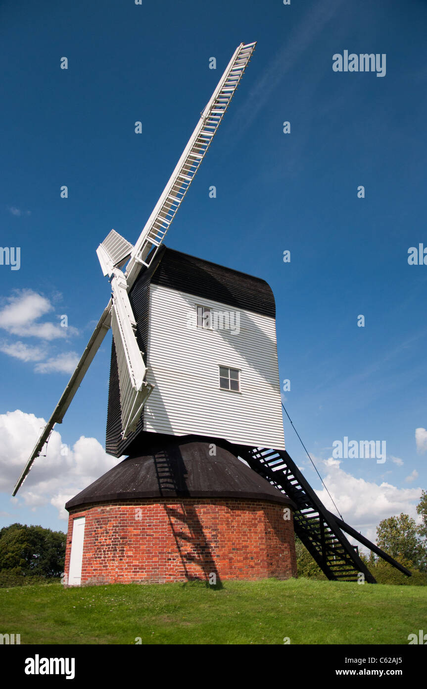 Mountnessing Post Mill set in the english countryside with a blue sky ...