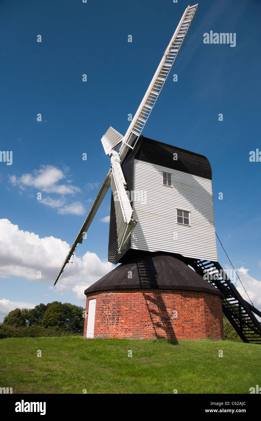 Mountnessing Post Mill set in the english countryside with a blue sky ...
