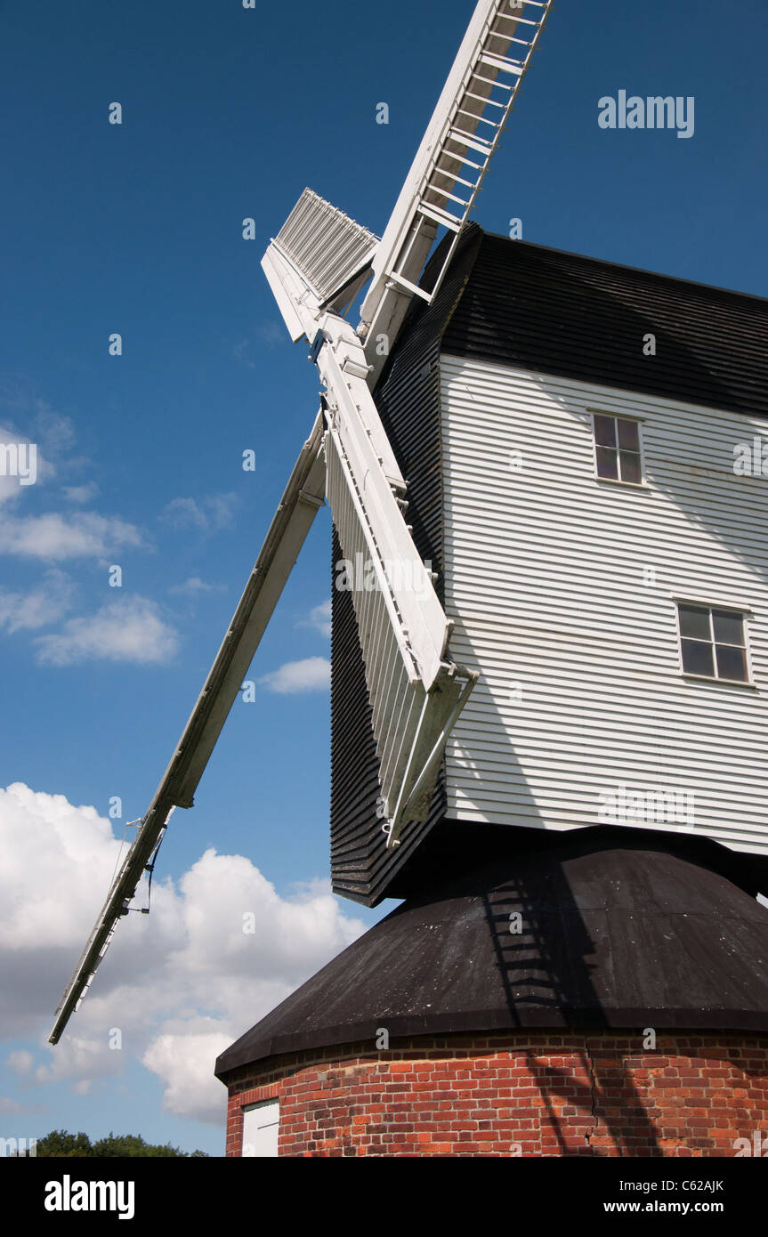Mountnessing Post Mill set in the english countryside with a blue sky ...