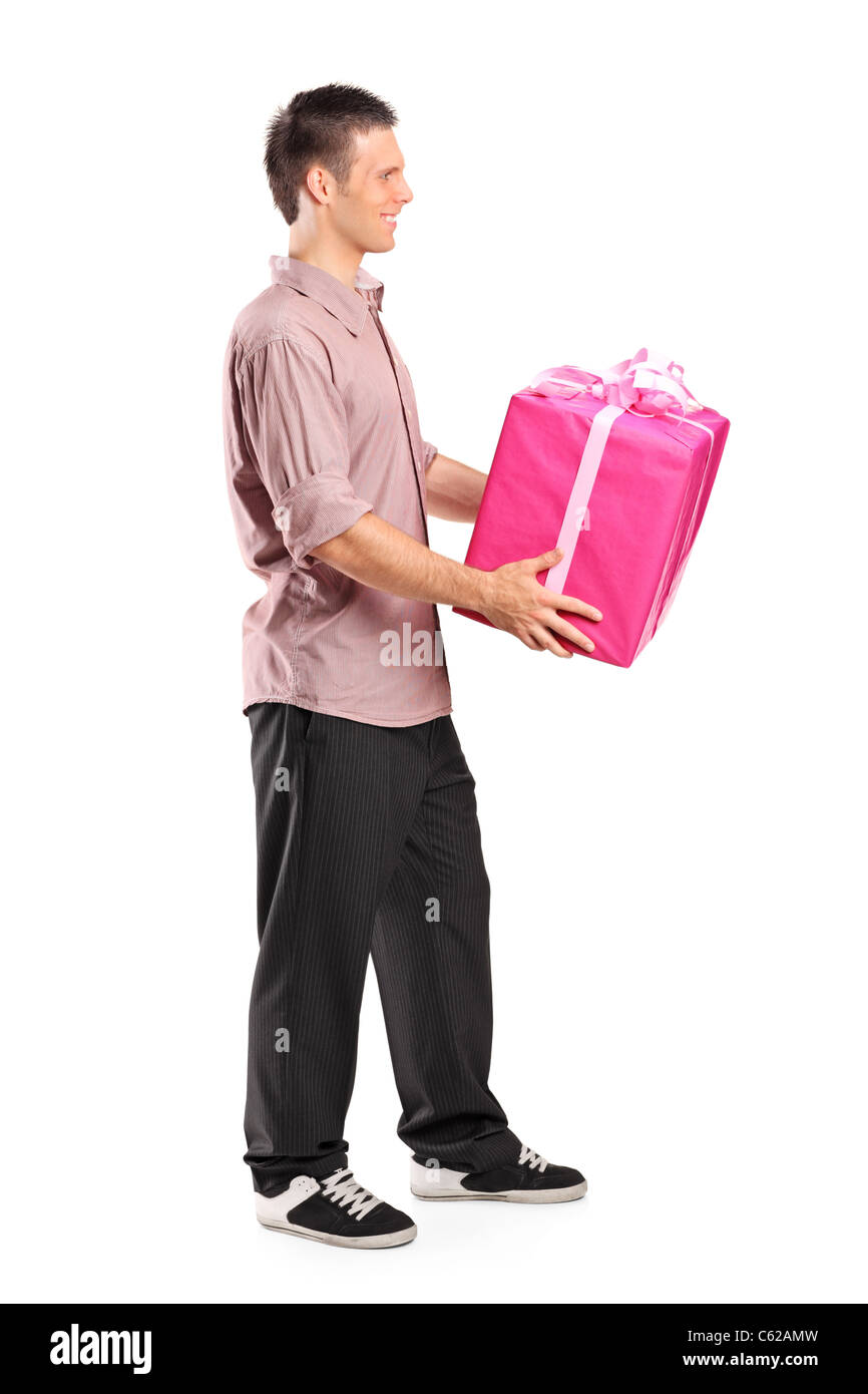 Full length portrait of a male giving a large gift Stock Photo - Alamy