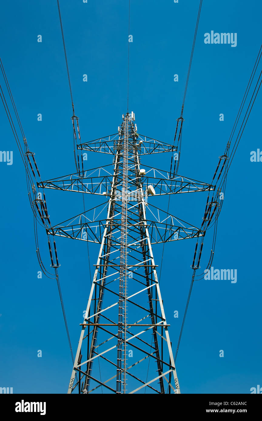 Power Supply Line against clear blue Sky Stock Photo - Alamy