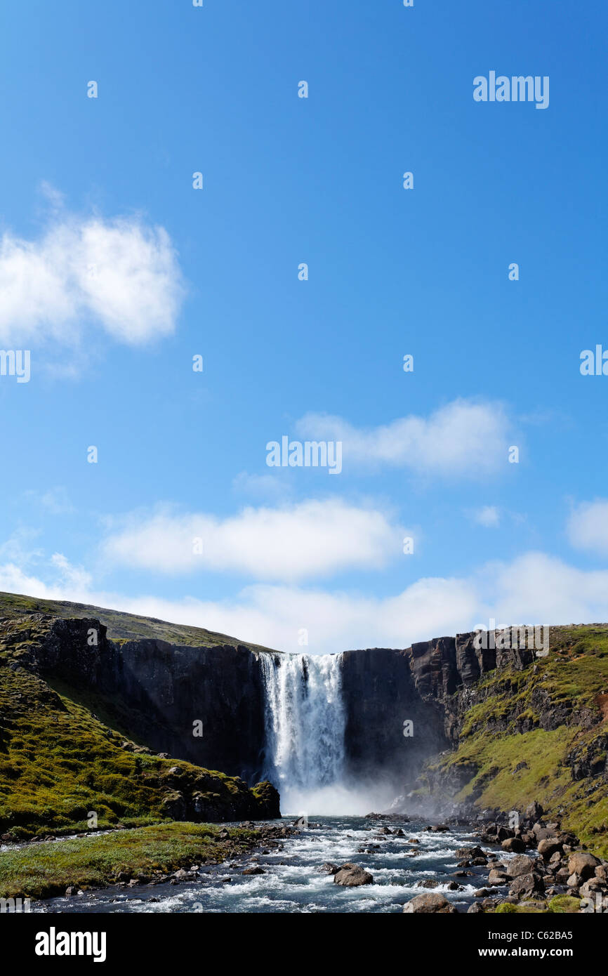 Gufufoss waterfall above the village of Seydisfjordur, Eastern Fjords ...