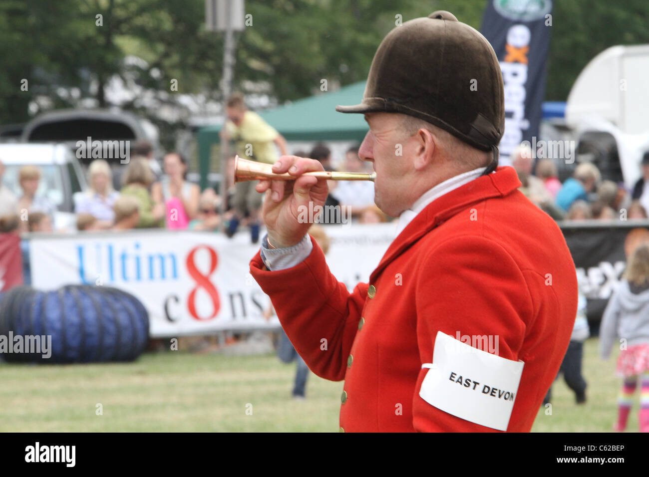 Blowing horn hi-res stock photography and images - Alamy