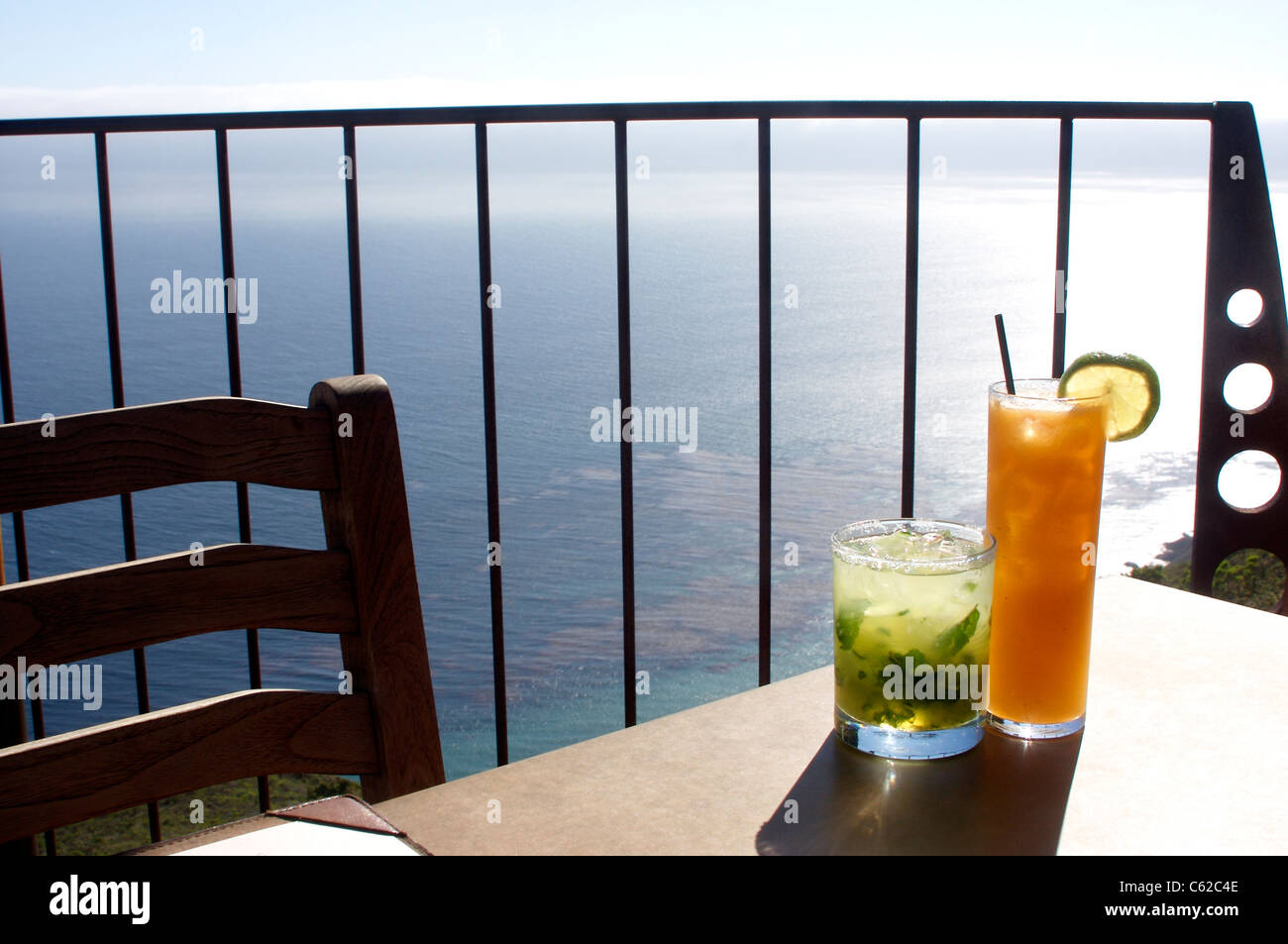 Cocktails overlooking the Pacific Ocean on the restaurant deck of the ...