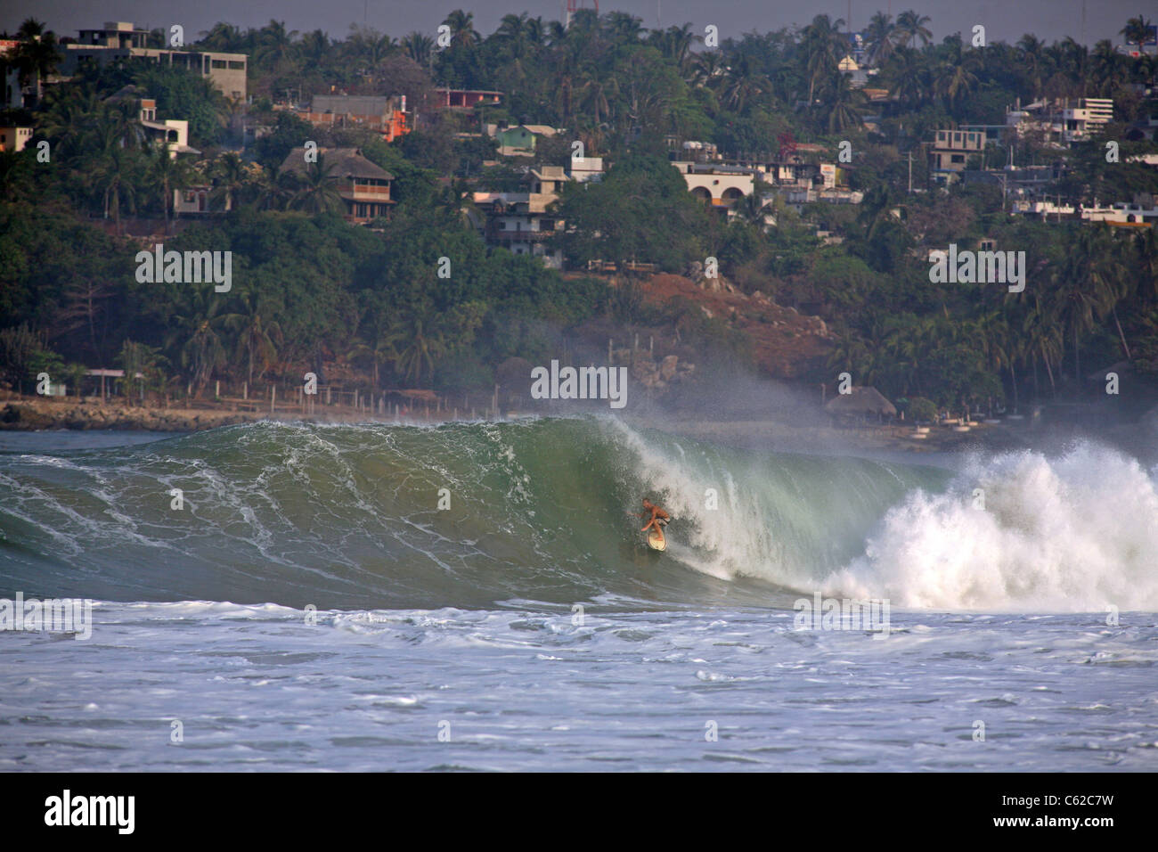 Surfing at the 'Mexican Pipeline' on Zicatela Beach. Puerto Escondido ...