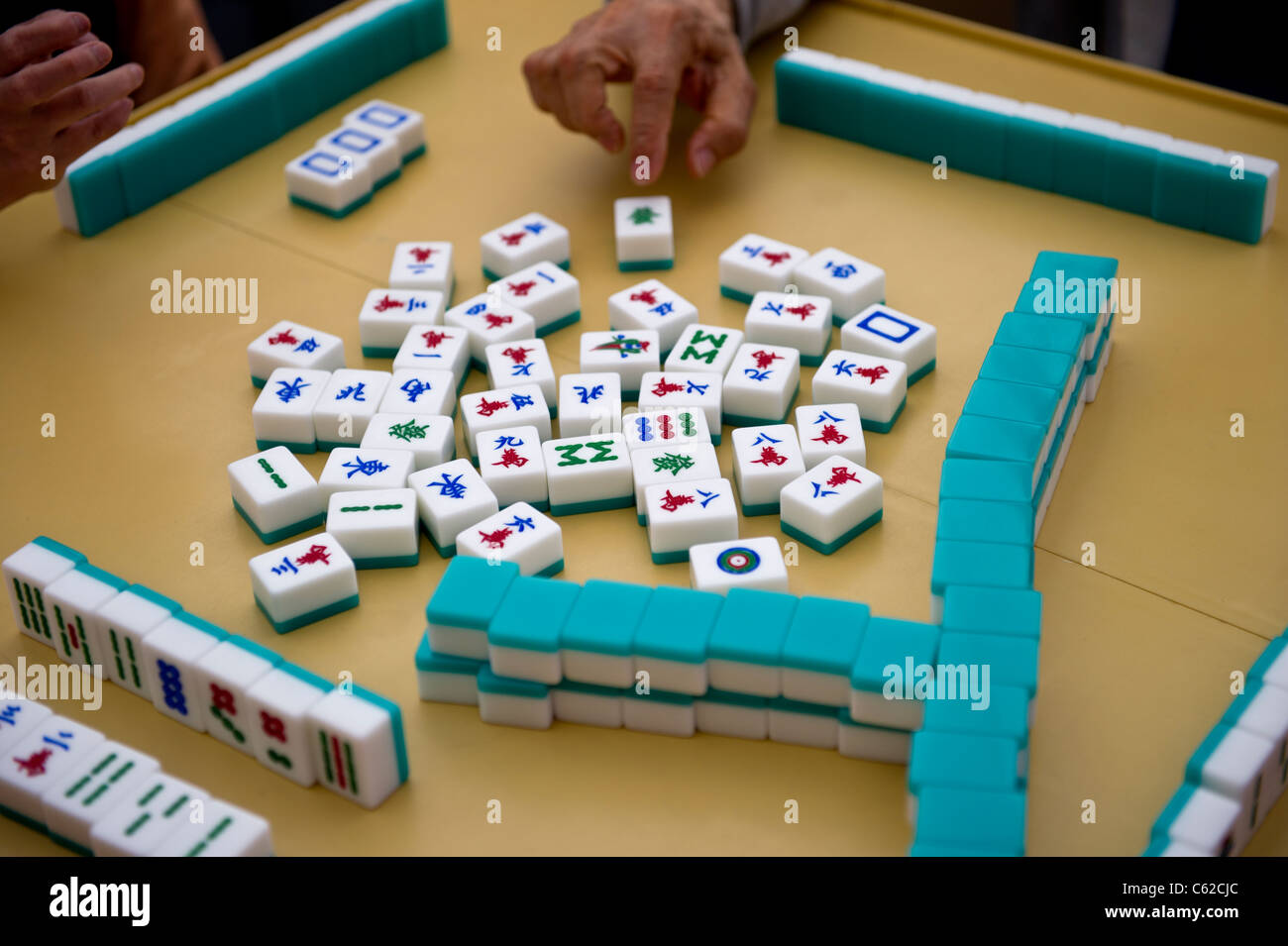 Playing mahjong in Calgary's Chinatown Stock Photo - Alamy
