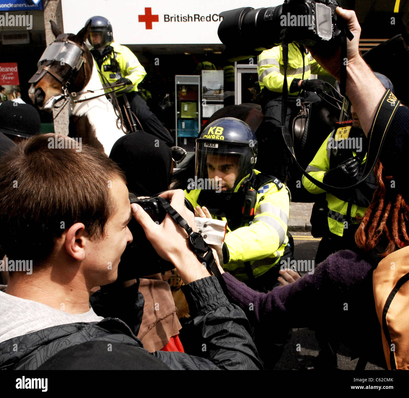 Smoke bombs are let off as Anti Arms protesters and police some on ...
