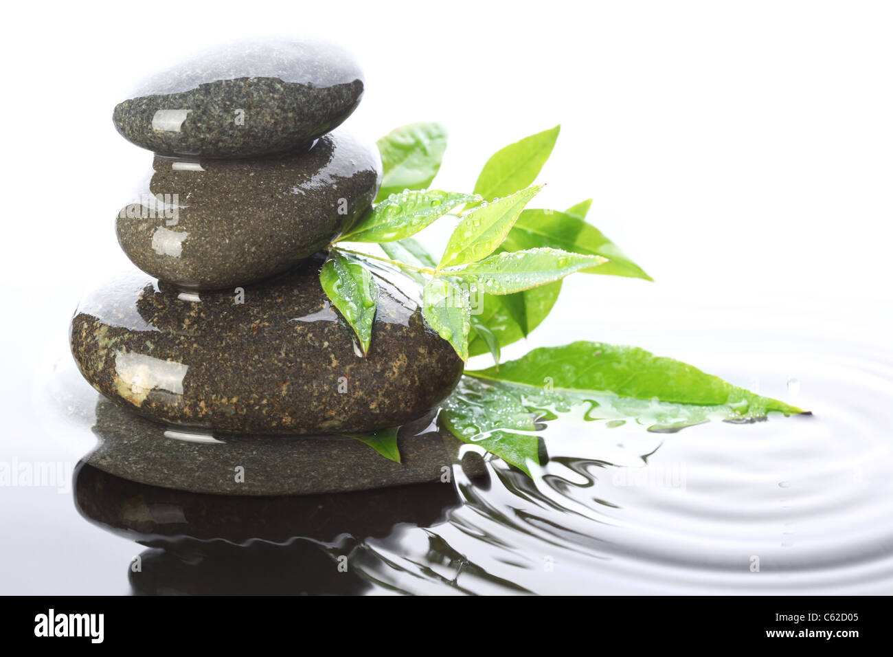 Stacked stones in water Stock Photo - Alamy