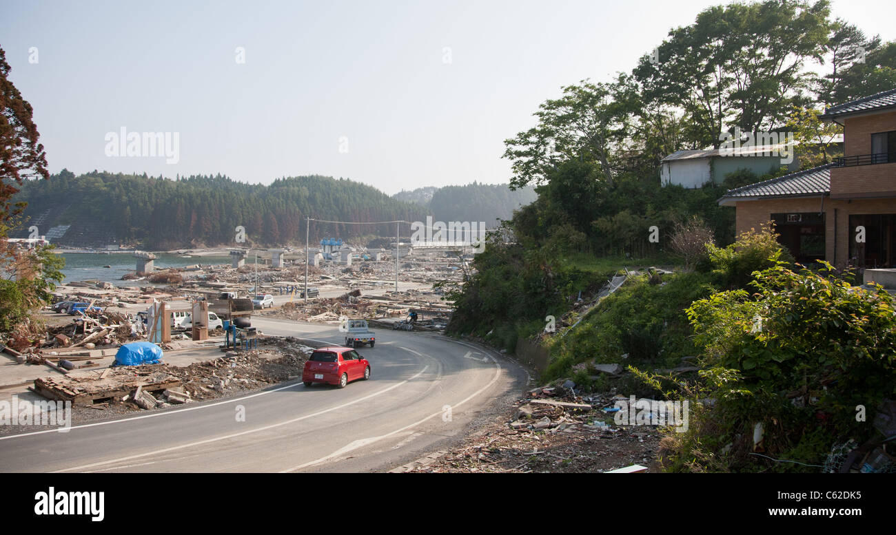 Car drives through tsunami damaged area hi-res stock photography and ...