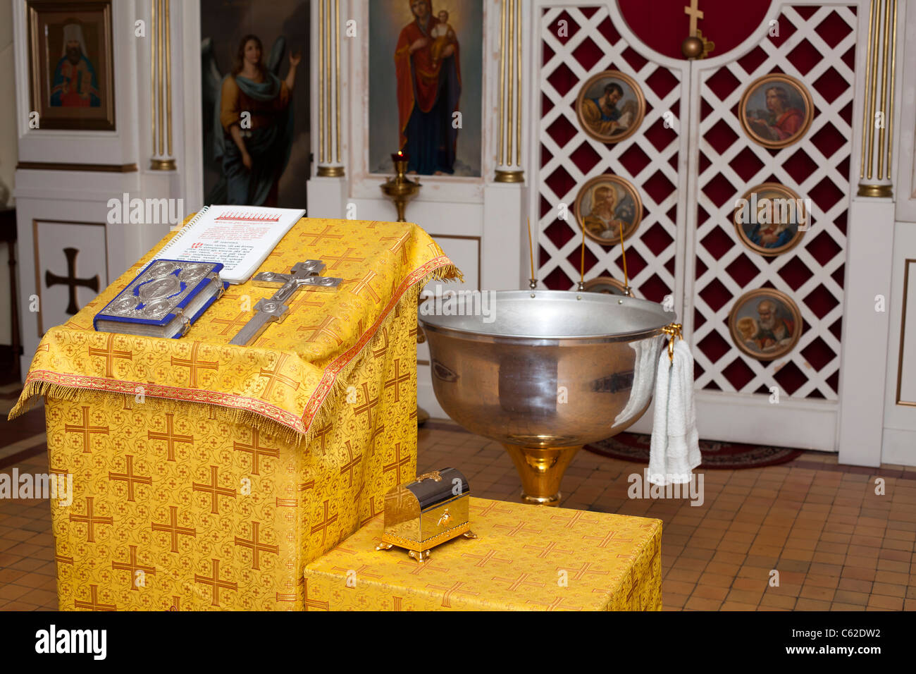 Supplies for Baptism in Russian orthodox church: table, cross, book and ...