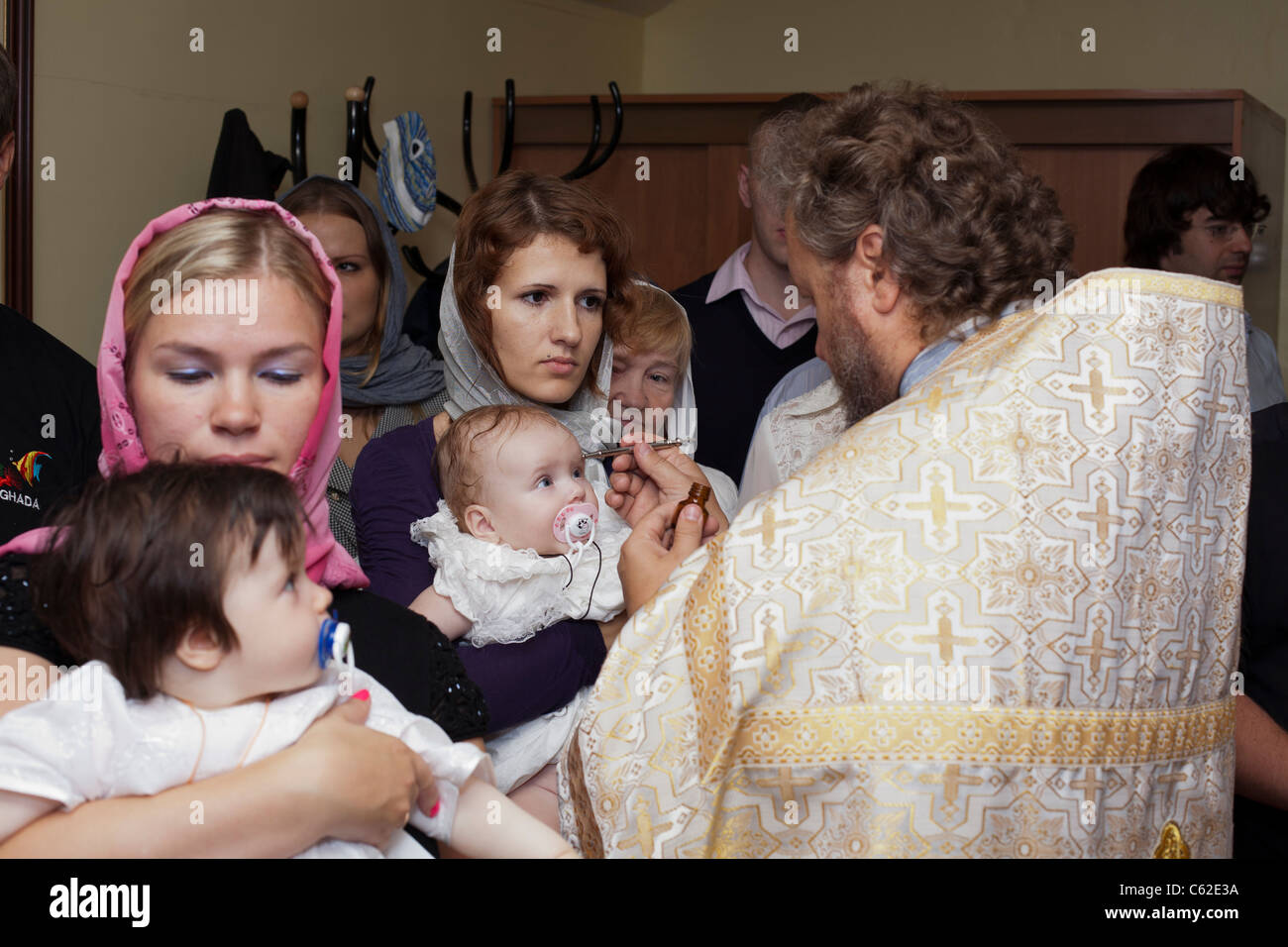 Little Children And Priest In Church High Resolution Stock Photography and Images - Alamy