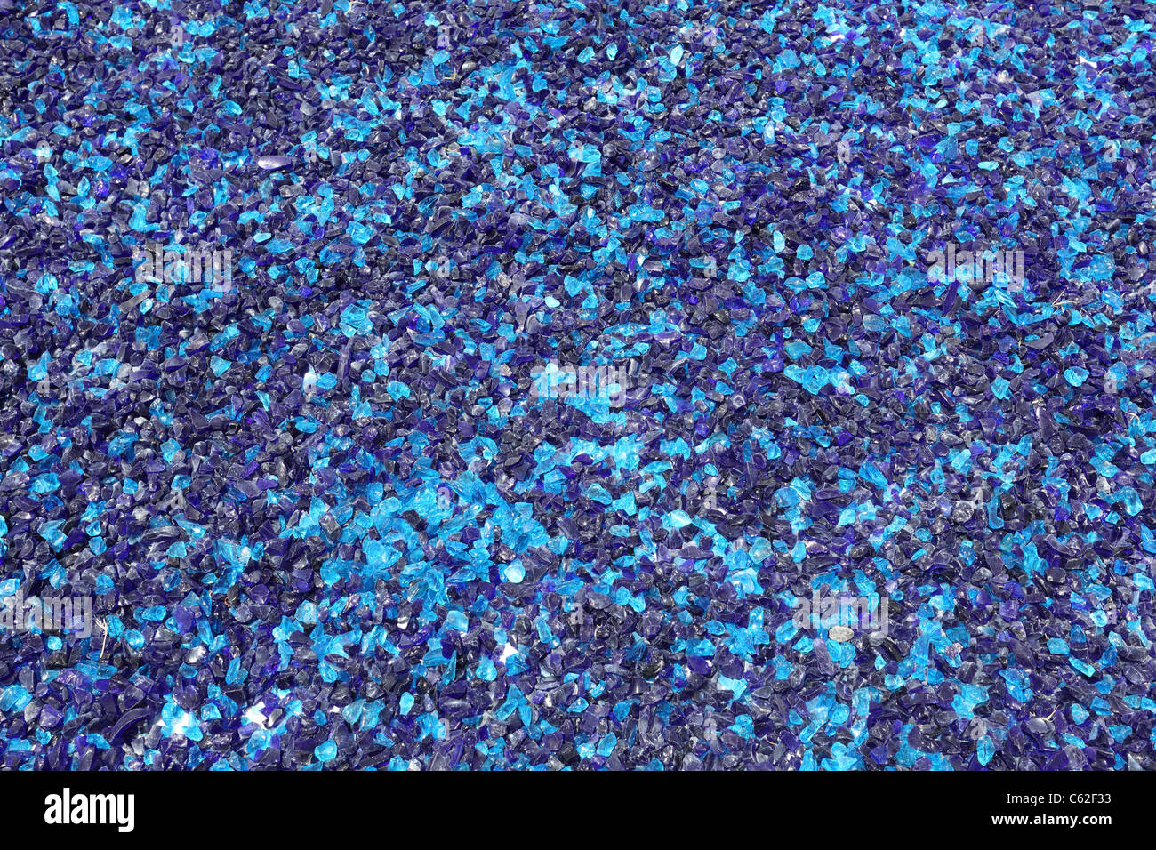 Blue crushed glass shards background Stock Photo - Alamy