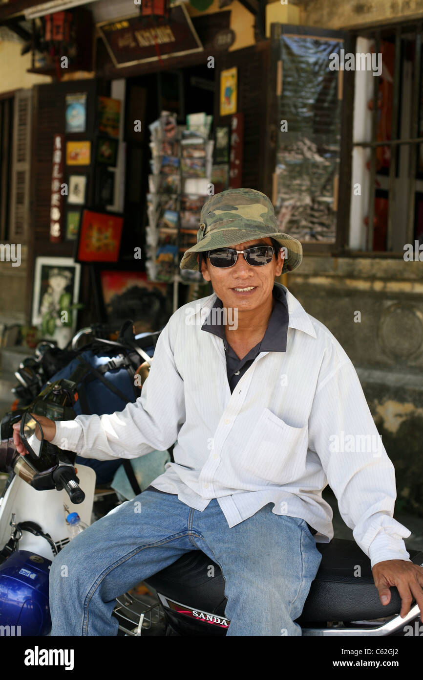 Vietnamese male sitting hi-res stock photography and images - Alamy