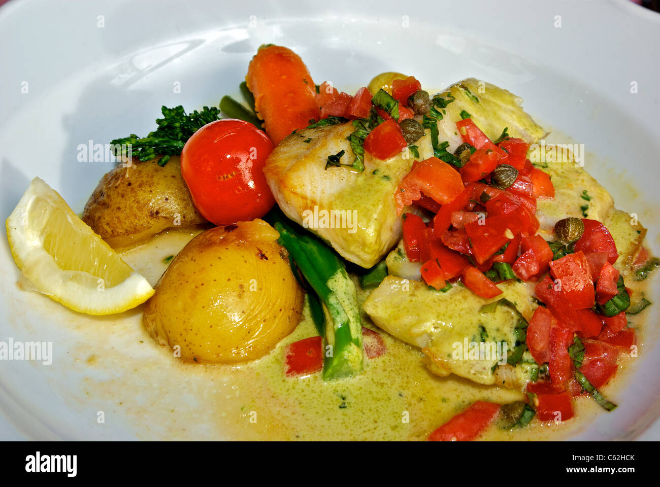Pan seared sablefish diced tomatoes capers broccoli potato main course ...