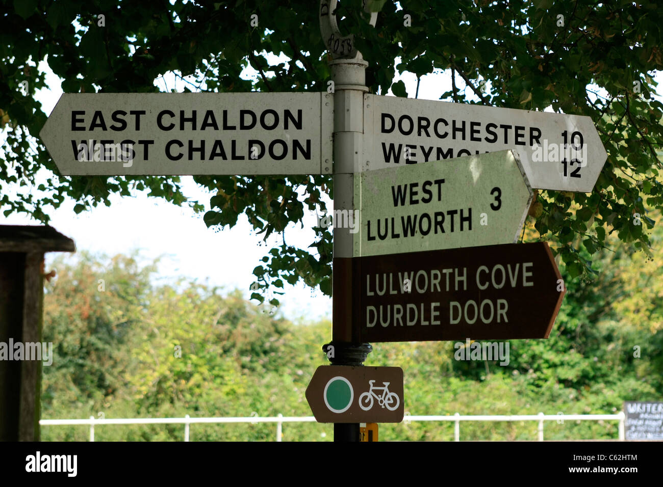 Old 1950s signpost directing traffic to various destinations in Dorset ...