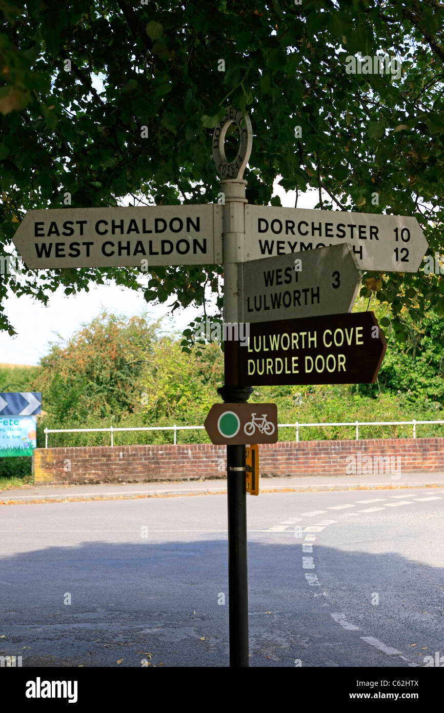 Old 1950s signpost directing traffic to various destinations in Dorset ...