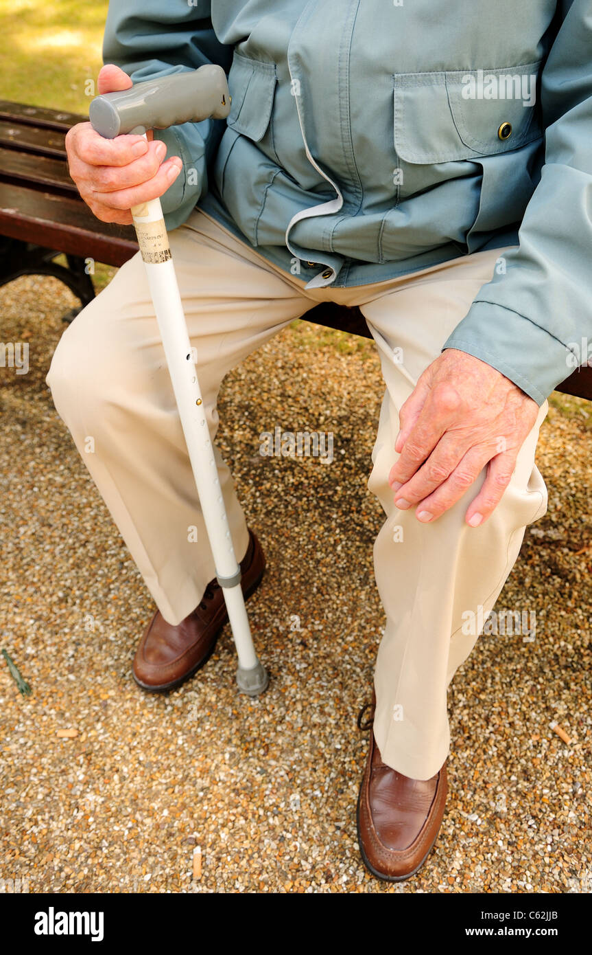 Elderly Man With Walking Stick Stock Photo - Alamy