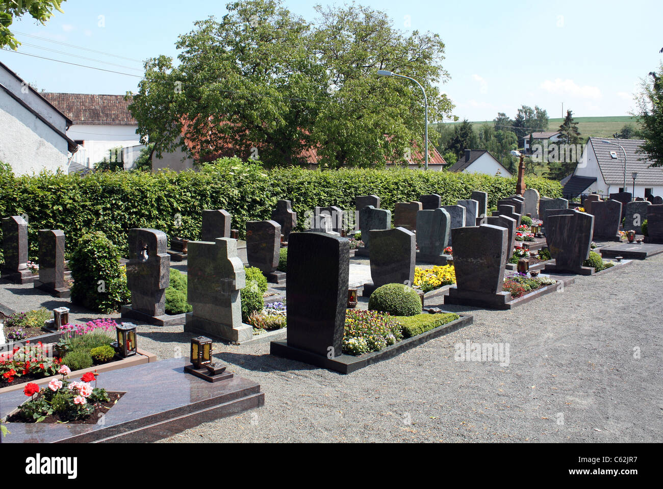 Small graveyard in a village in Germany Stock Photo - Alamy