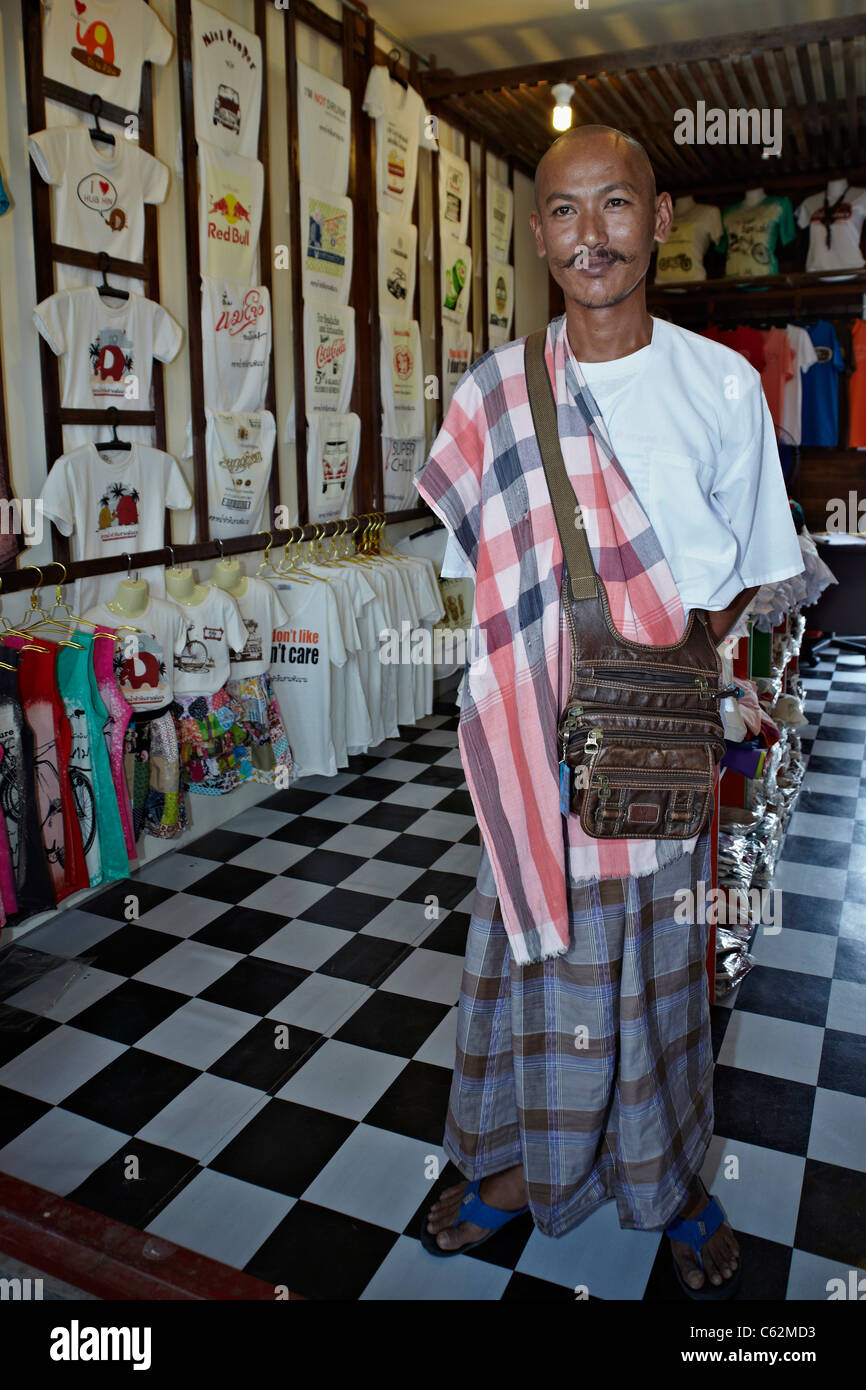 Asian shopkeeper in traditional dress. Thailand Asia Stock Photo - Alamy