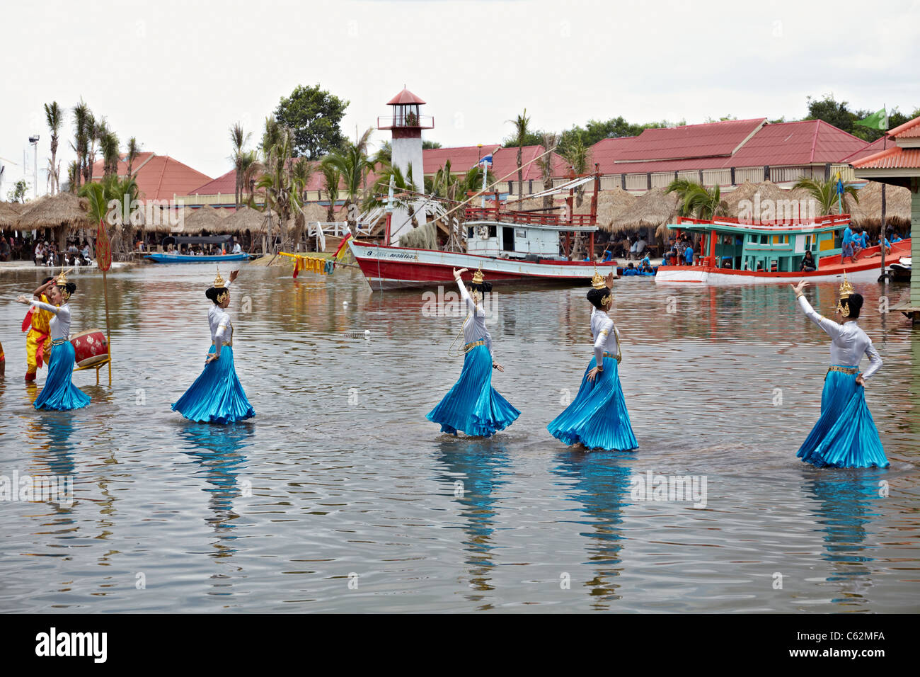 Dancing on water. Thailand dancers performing on a lake from a ...