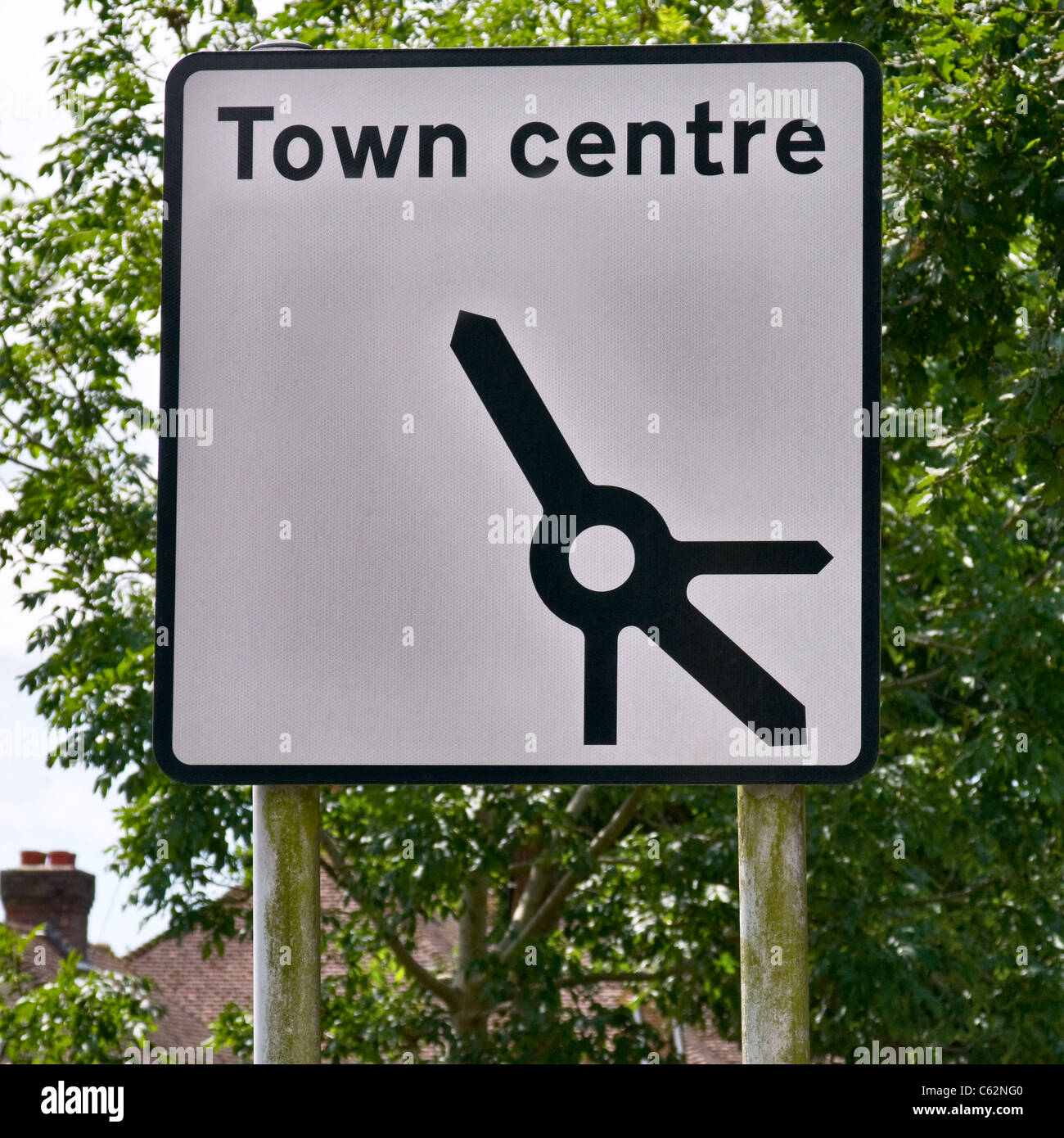 Road sign pointing to the town centre (includes roundabout detail Stock ...
