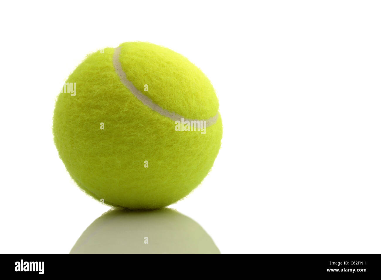 Tennis ball with a reflection on a white background Stock Photo - Alamy